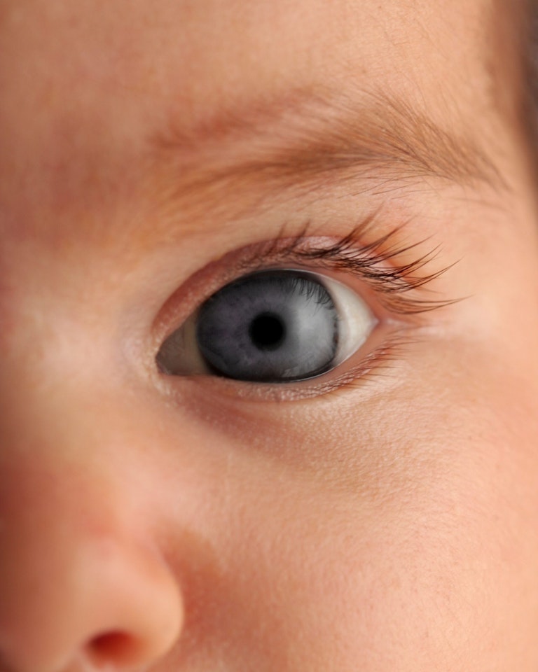 When can babies see clearly?