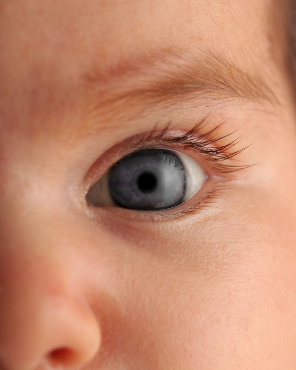 When can babies see clearly?