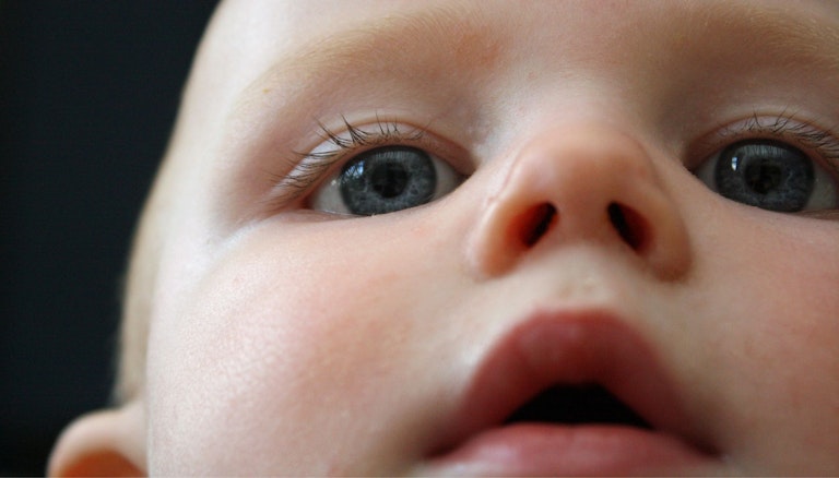 When can babies see clearly?