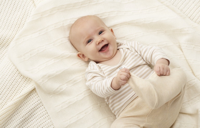 What age do babies smile? We found out from an expert
