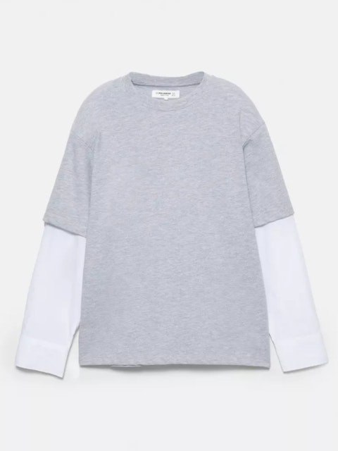 Remember The Early '00s Trend For Layering Tops? It's Back