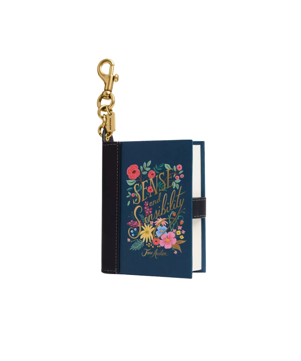 You Can Officially Wear Your Reading List Thanks To Coach’s New Book Charms