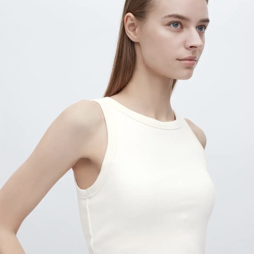 A £19.90 tank top with an INBUILT BRA has gone viral and it’s genius ...