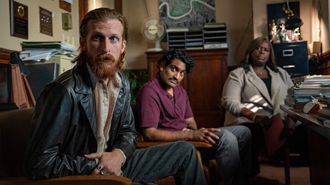 Hit Man Review – 'A slick, seductive romantic thriller"