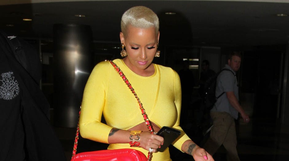 Amber Rose shows off her bum in white skimpy swimsuit | Celebrity | Heat