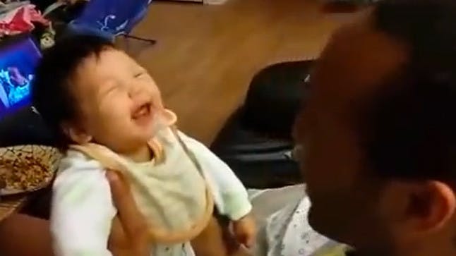 WATCH: Adorable video of a baby laughing for the first time | Closer