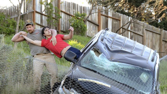 Pictured: Moment man is dramatically pulled from car hanging off cliff ...