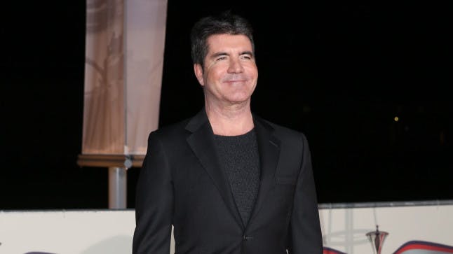 Simon Cowell shares adorable ‘grumpy’ snap with baby Eric | Closer