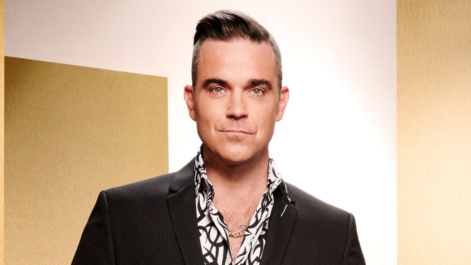 Robbie Williams reveals why he's a judge on The X Factor
