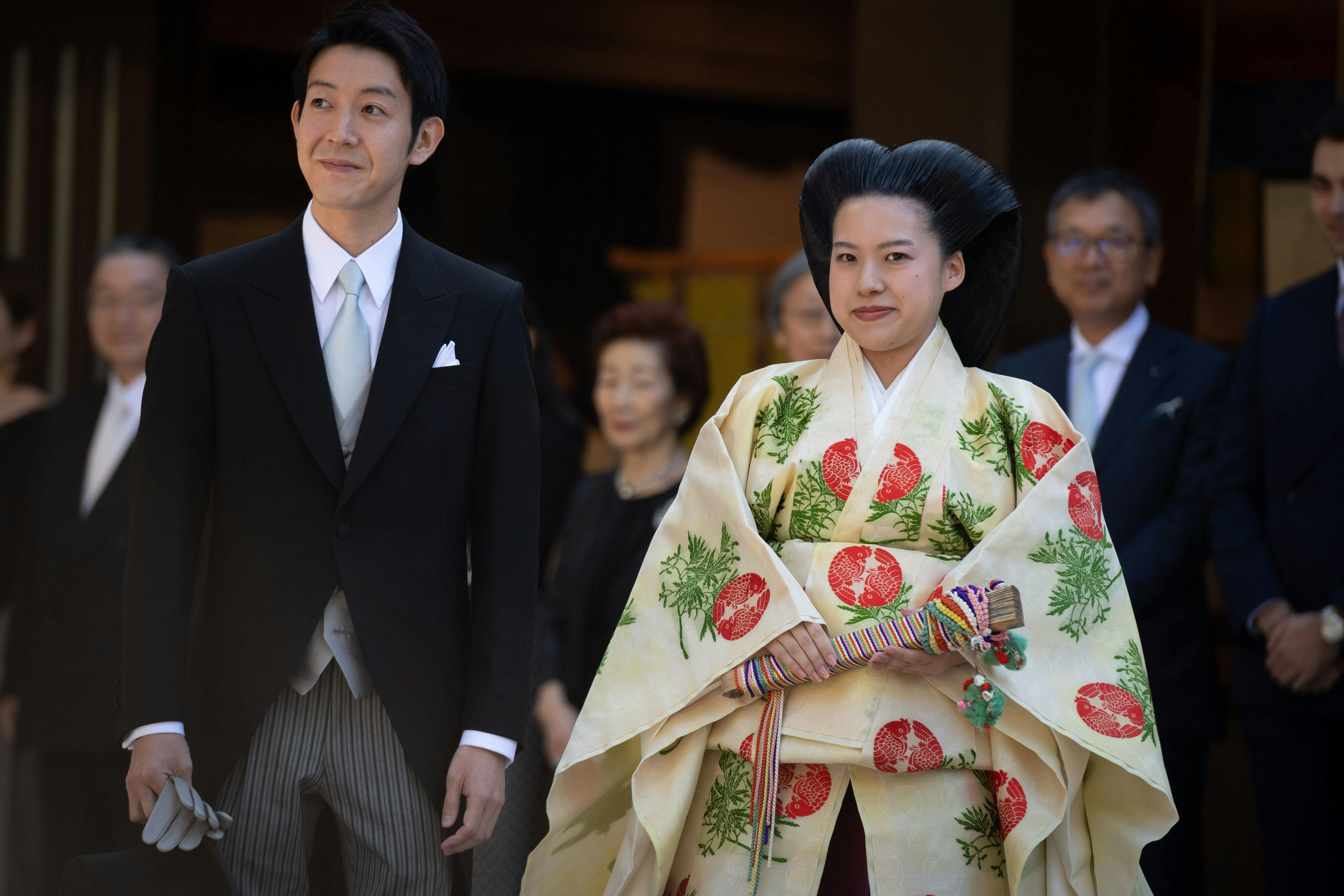 Japan's Princess Ayako forfeits royal title by getting married