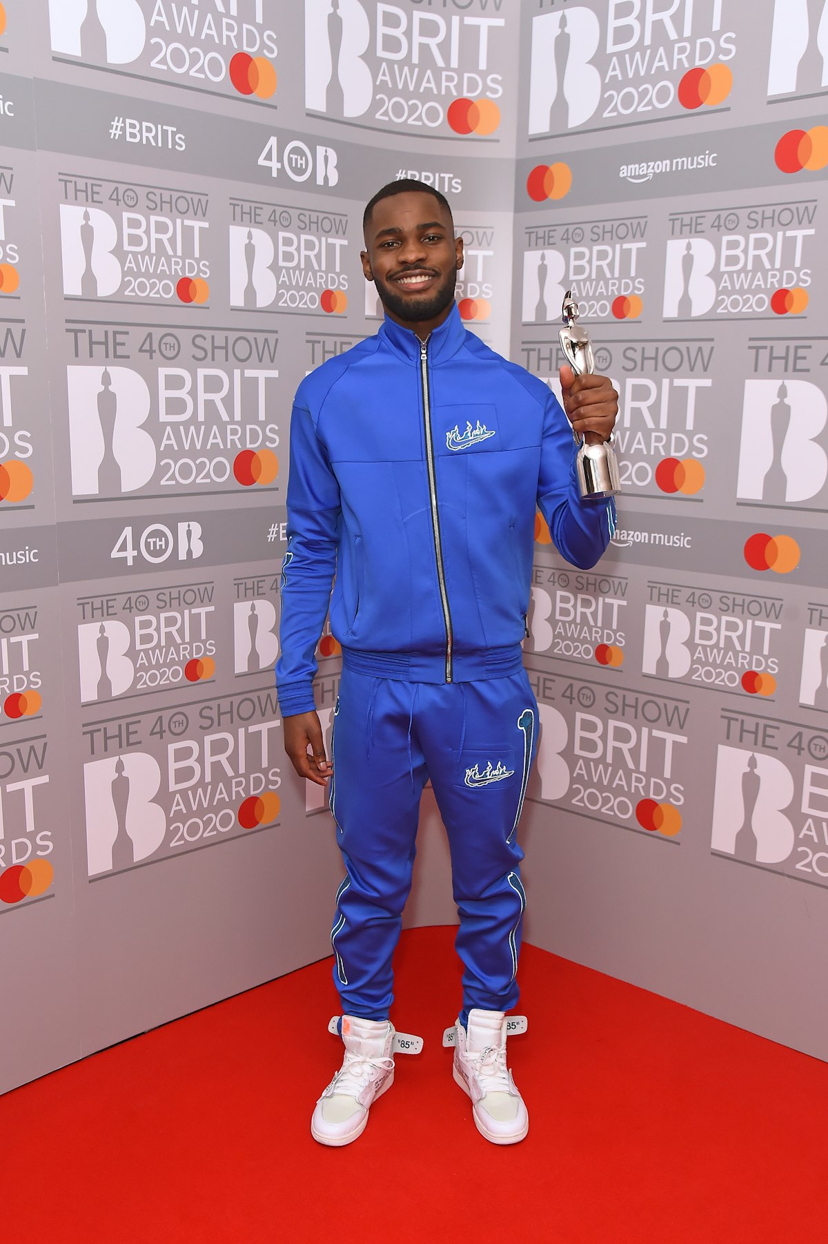 BRIT Award winner Dave calls out 'racists' in emotional speech