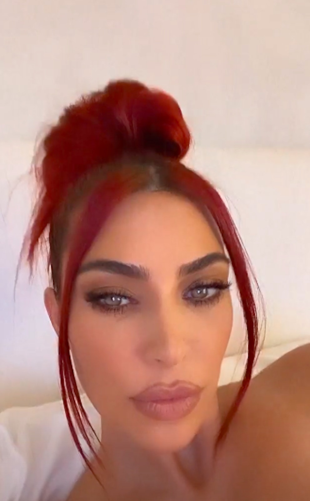 Kim Kardashian has just dyed her actual hair red and we're shook