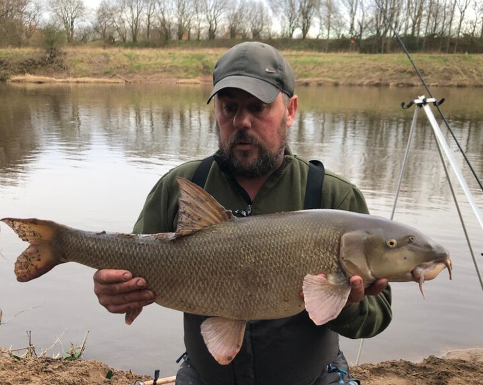 River record barbel breaks the net handle! | Angling Times