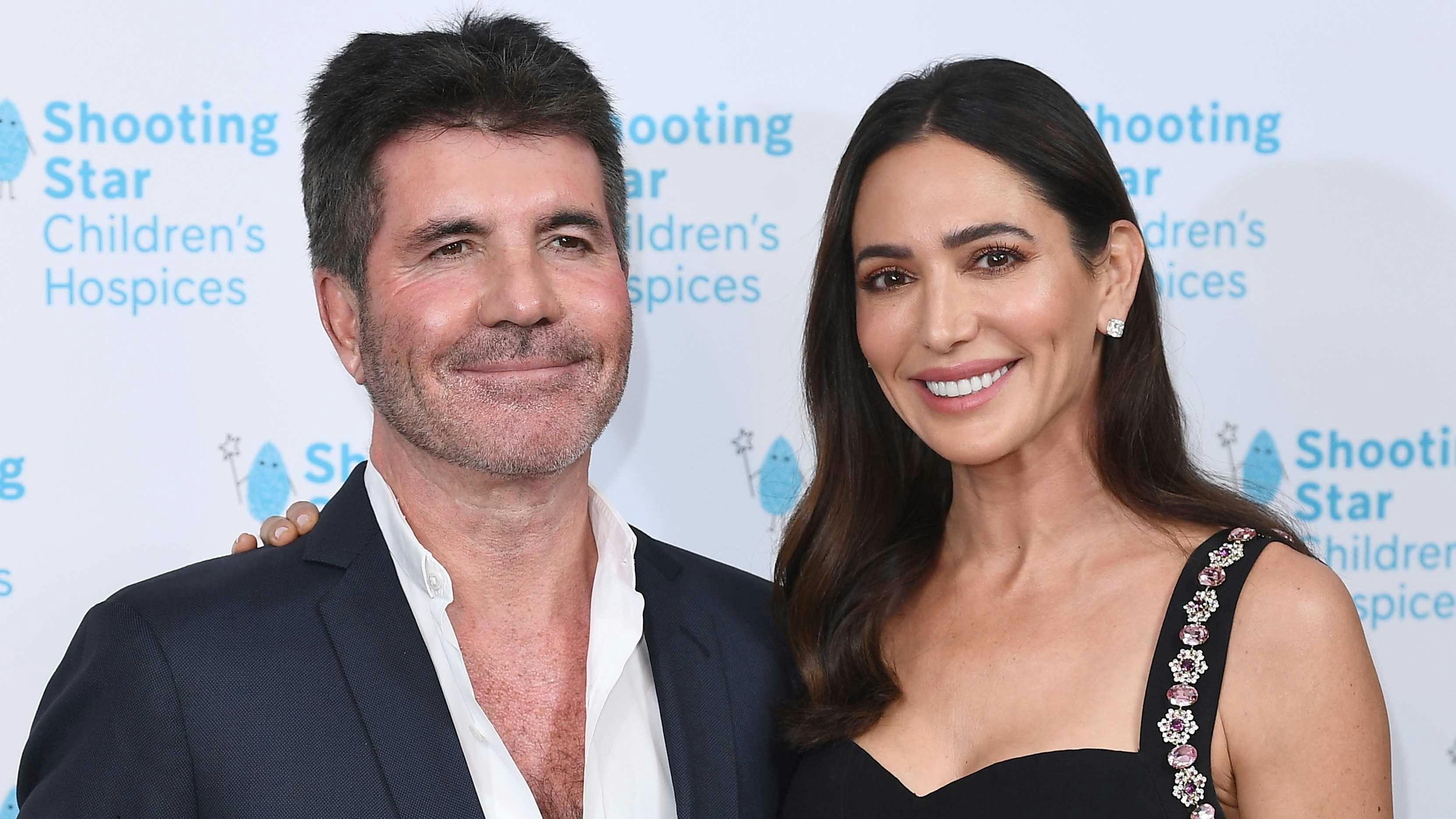 Simon Cowell And Mezhgan Hussainy Kissing