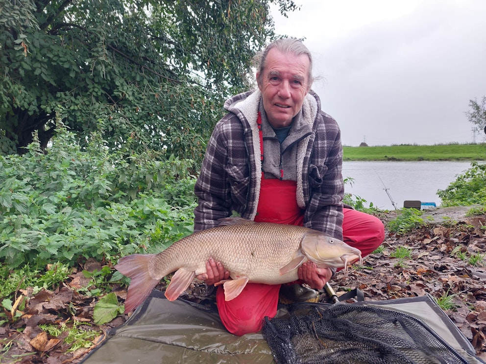 Huge 19lb-plus Trent barbel falls to maggots on holiday fishing trip ...