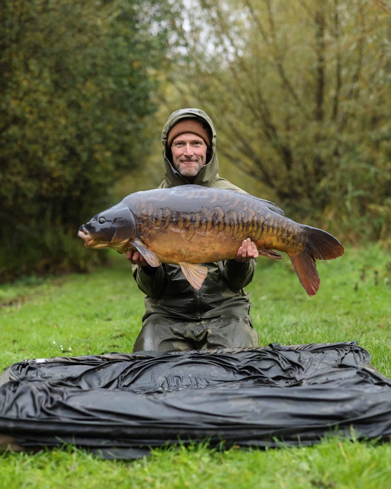 Darrell Peck lands UK’s biggest fully-scaled carp | Angling Times