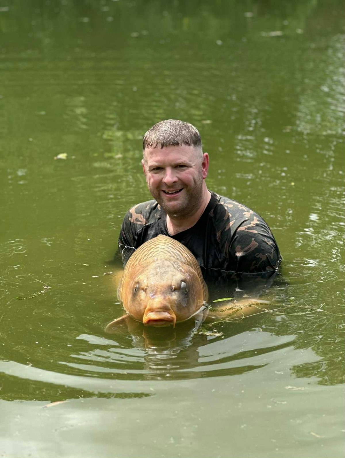 Angler banks the biggest-ever brace of UK ghost carp | Angling Times