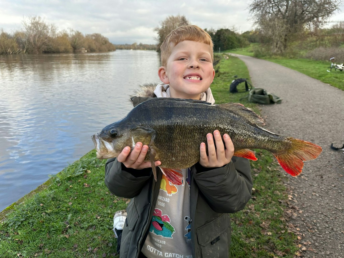 Child lands monster Thames perch on first fishing trip | Angling Times